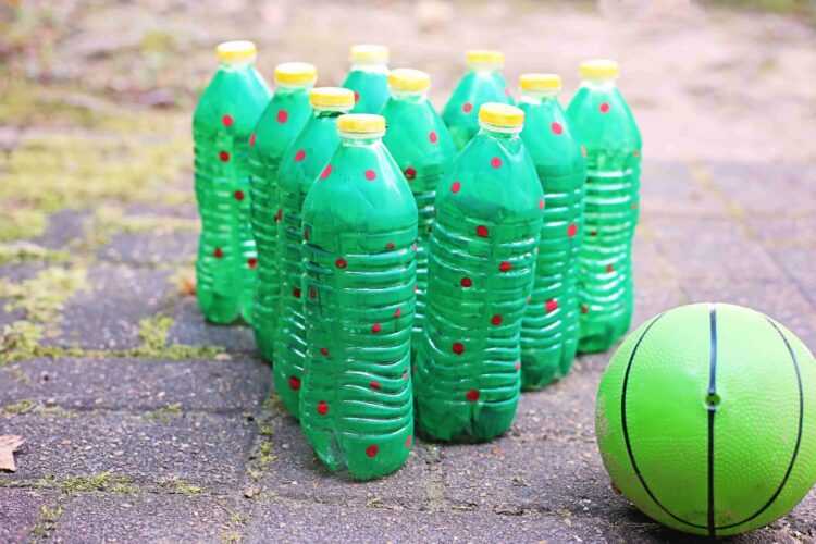 Christmas Tree Bowling: A Christmas Activity for Kids - Cultivating ...