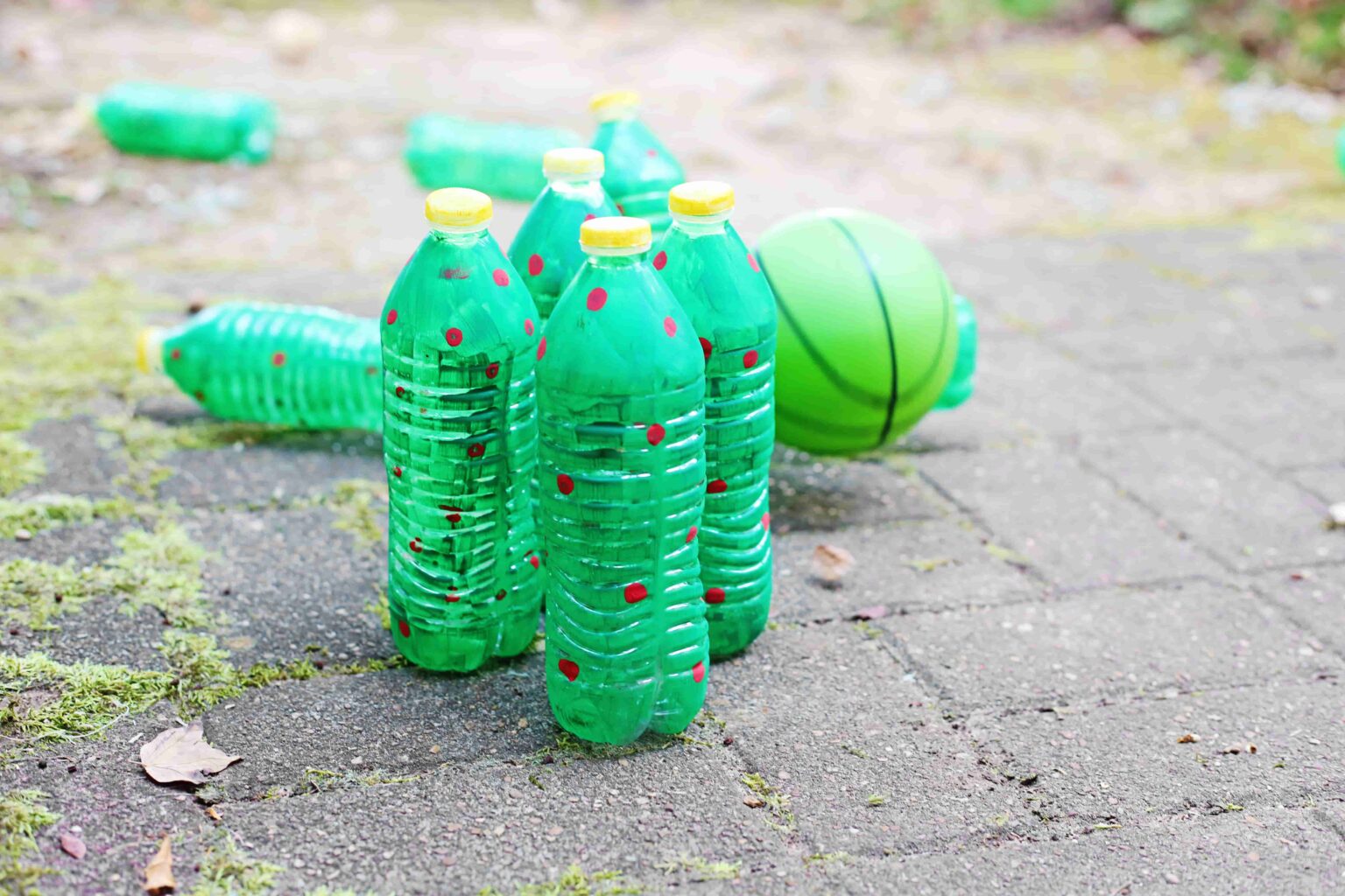 Christmas Tree Bowling: A Christmas Activity for Kids - Cultivating ...